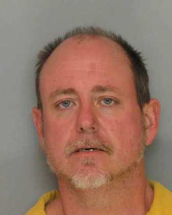 Man charged with stealing cash from sub shop, ID for shopping spree ...