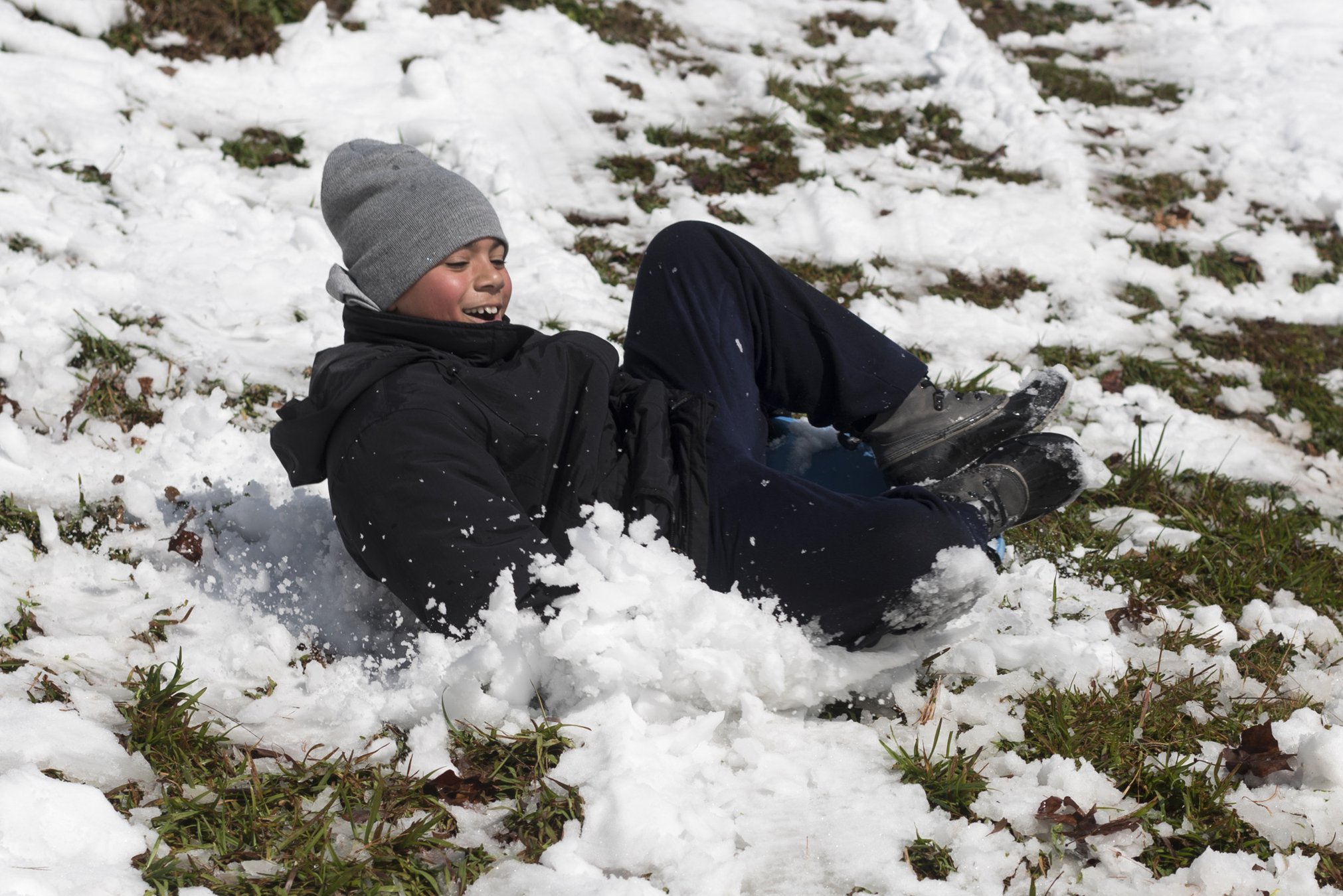 Worst of storm over, kids enjoy early snowfall - Gainesville Times