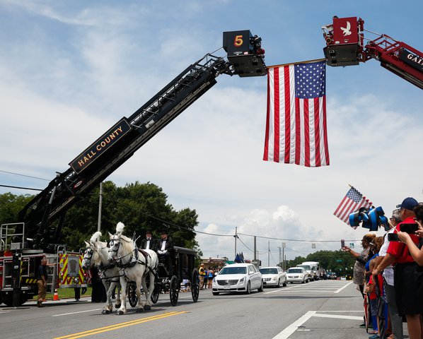 Hundreds line streets for fallen deputy’s funeral procession ...