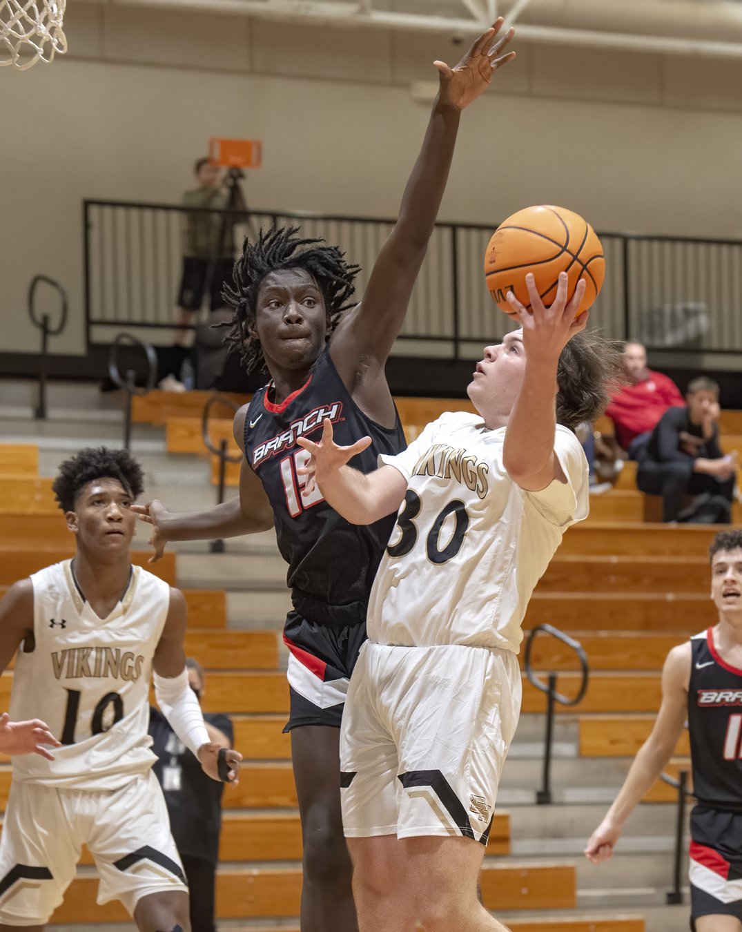 High school basketball: East Hall boys escape with narrow region ...