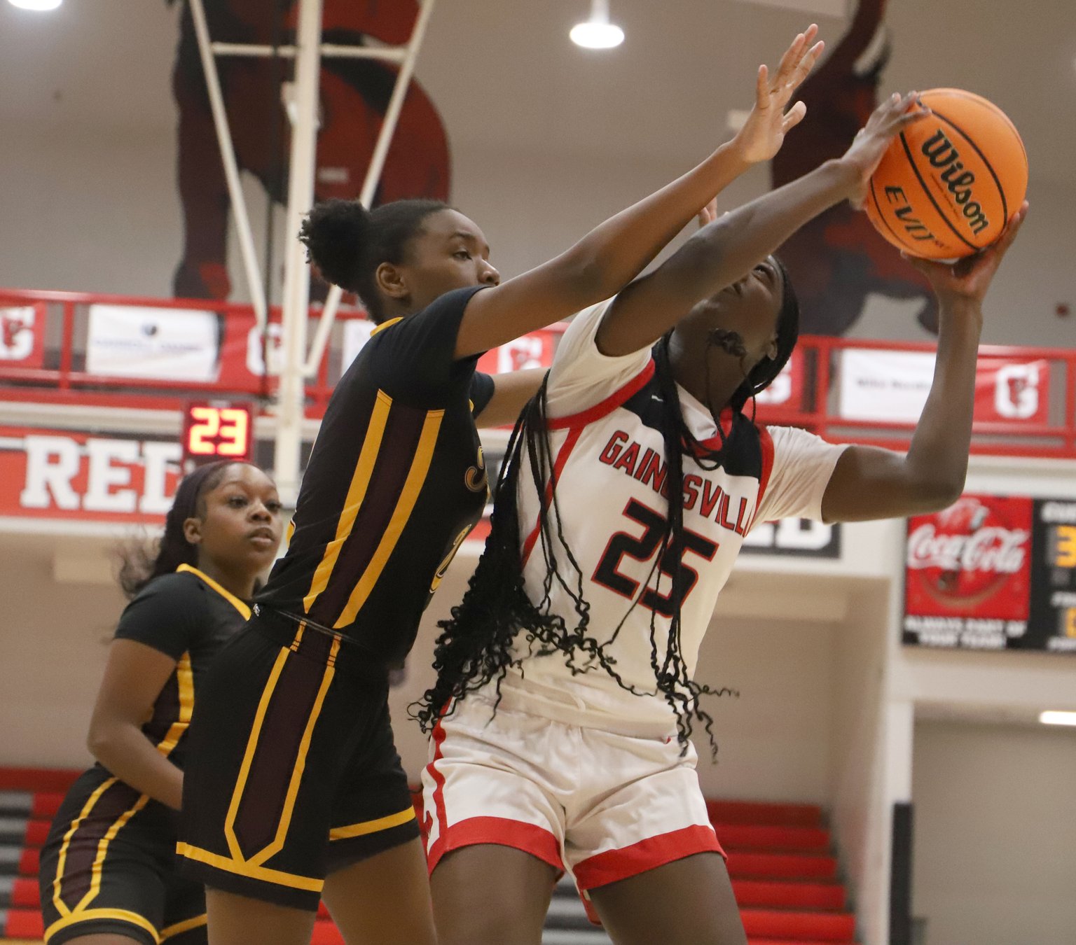 High school basketball: Gainesville girls dominate on both ends of the ...