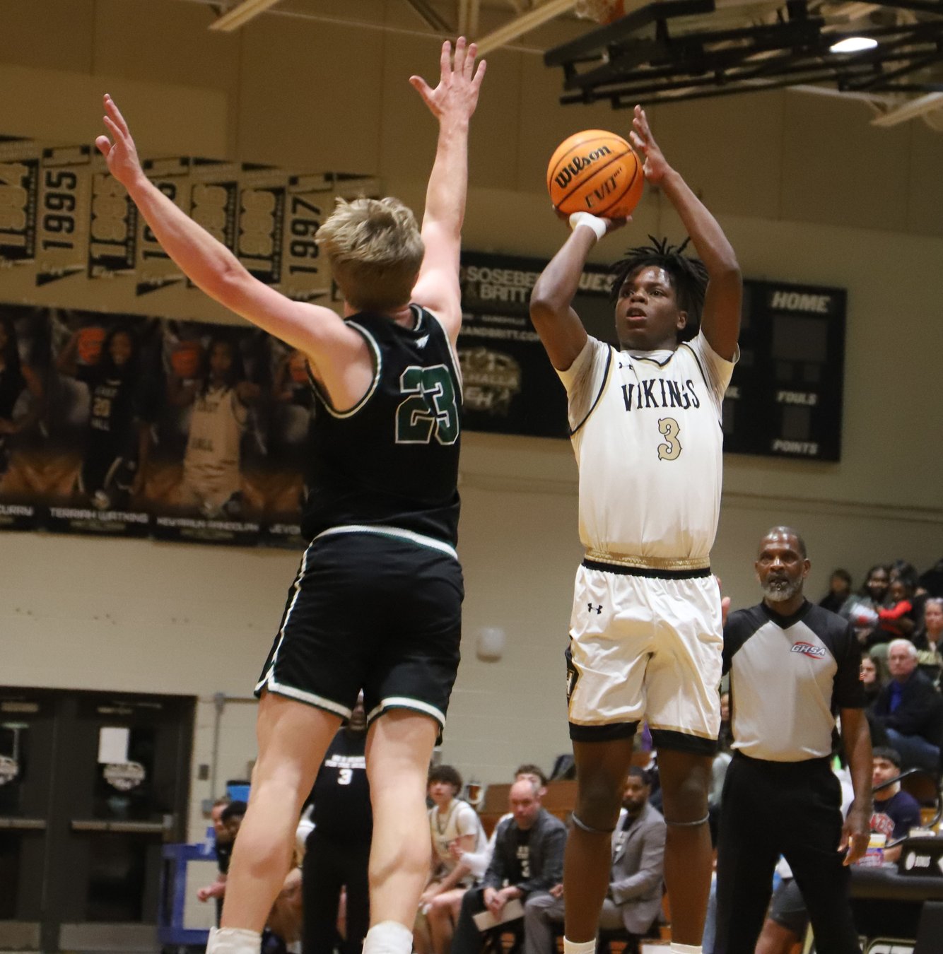 High school basketball playoffs: Motivated East Hall boys dominate North Hall in first round of ...