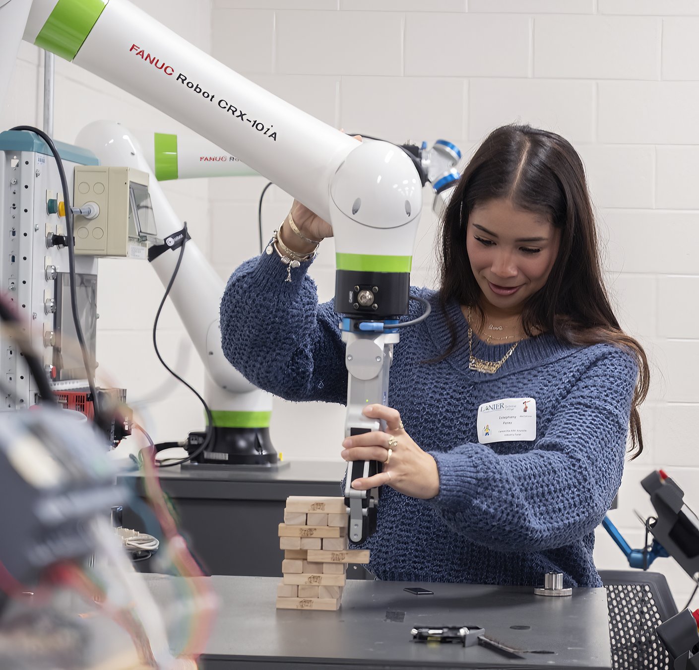 From welding torches to big rigs, Lanier Tech shows girls that blue-collar jobs aren’t just for ...